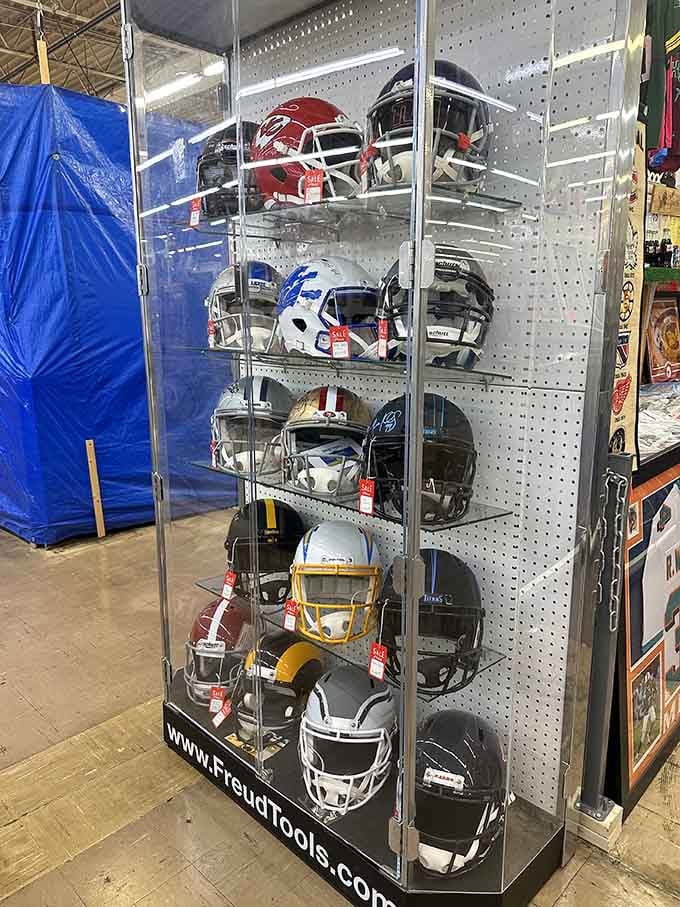 Football helmets stand ready for collectors and fans who understand that sports memorabilia is serious business, not child's play.