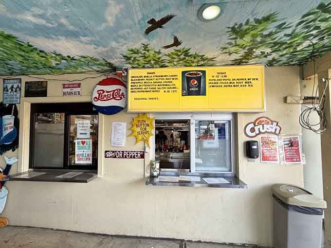 The order window where dreams are spoken and hunger meets its match, complete with vintage signage and honest-to-goodness character.