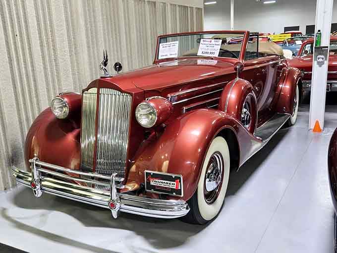 Burgundy curves and whitewall tires, proving that 1937 understood luxury better than we ever will again.