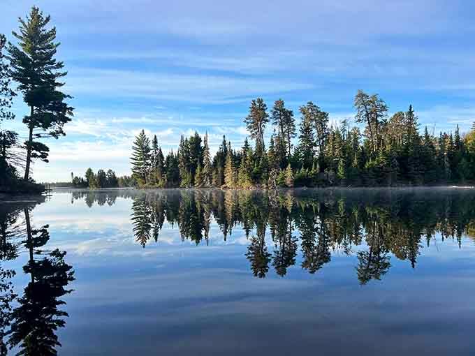 Morning mist on a Boundary Waters lake creates reflections so perfect they'll make your Instagram followers weep with envy.