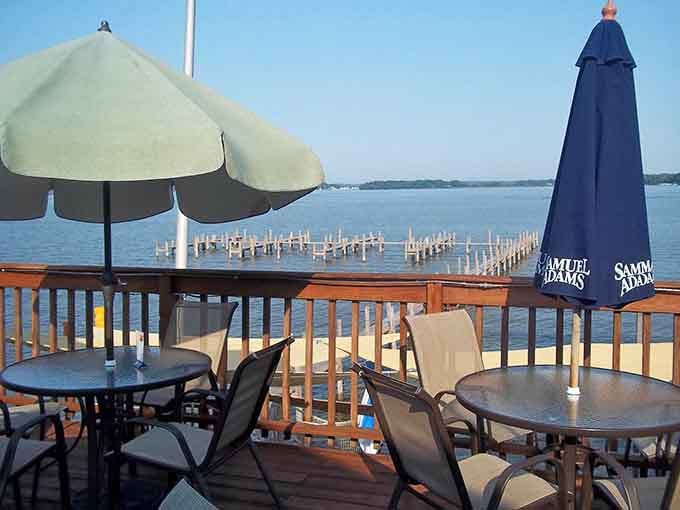 Waterfront deck seating where umbrellas shade you while Fox Lake provides the entertainment and endless eye candy.