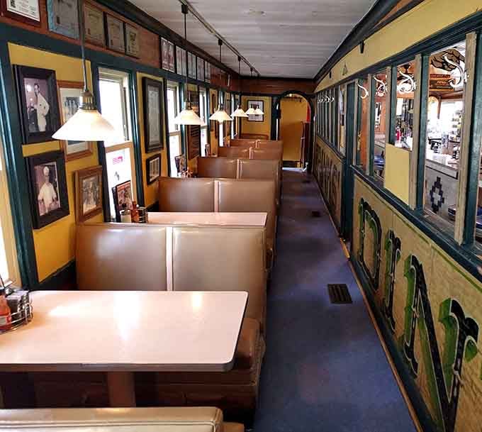 Vintage booth seating lined with old photographs creates an intimate dining room that feels like eating breakfast in a time machine.