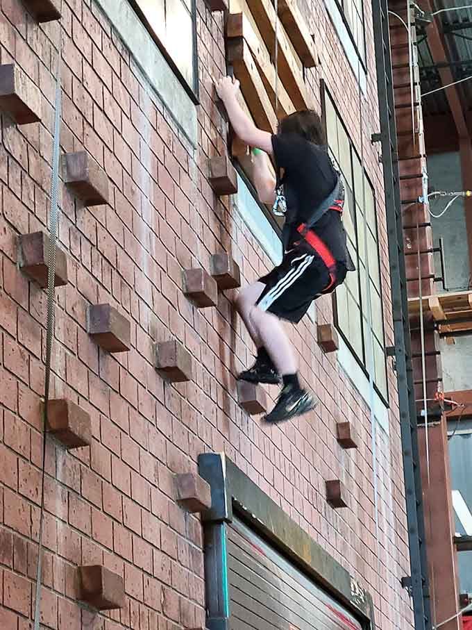 That climbing wall has more holds than a telemarketer's script, and you'll need every single one.