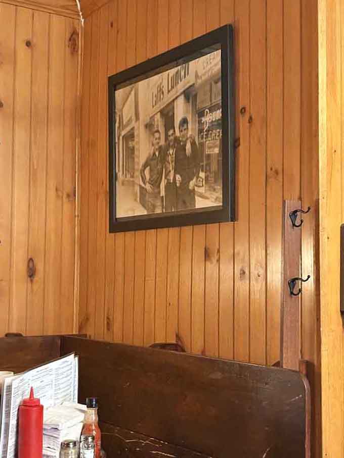 Vintage photographs on wood-paneled walls tell stories of the neighborhood's history while you enjoy your present-day meal.