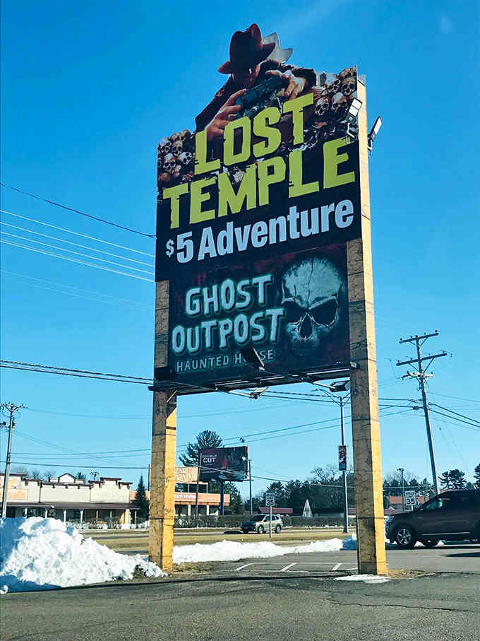 The roadside sign promises adventure, though "adventure" here means voluntarily subjecting yourself to professional-grade scares and loving every minute.