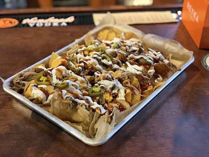 Those smothered house chips loaded with toppings are what happens when nachos and fries have a beautiful baby.
