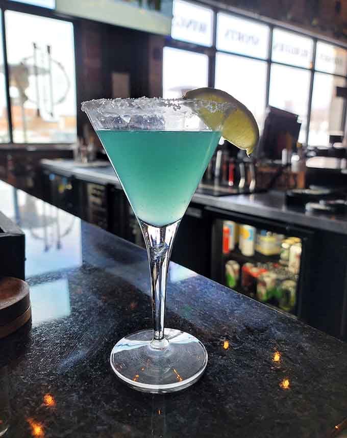 This turquoise cocktail looks like it belongs in a tropical paradise, not a firehouse, but we're certainly not complaining here.