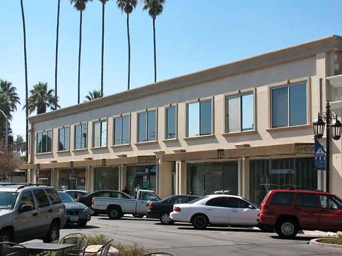 Downtown storefronts with actual character beat cookie-cutter strip malls every single time, no contest.