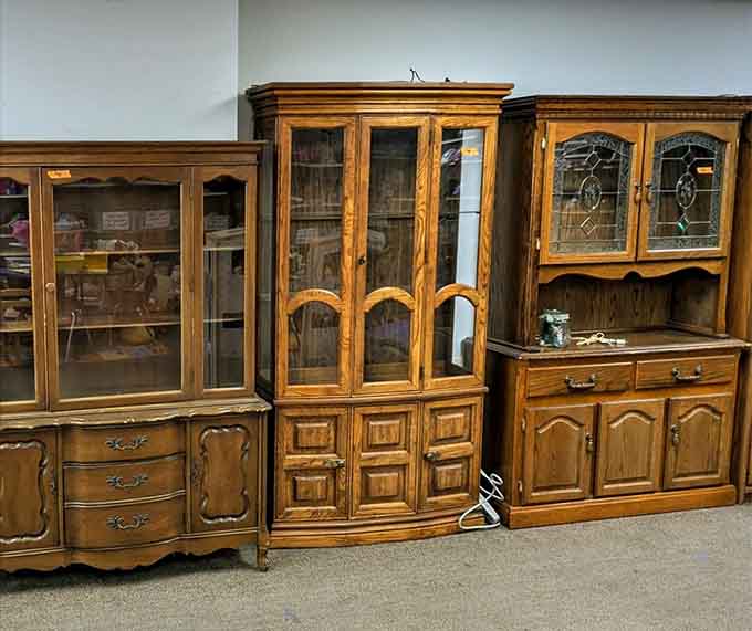 Wooden display cabinets showcasing that vintage craftsmanship your grandparents appreciated, now available for your own dining room.