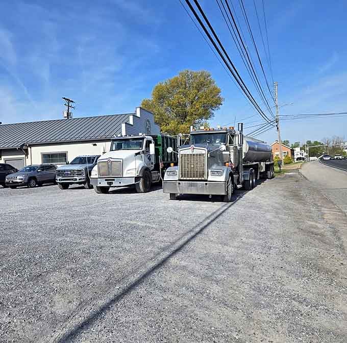 Even the working trucks know where to find lunch, parked roadside near Pennsylvania's best-kept barbecue secret.