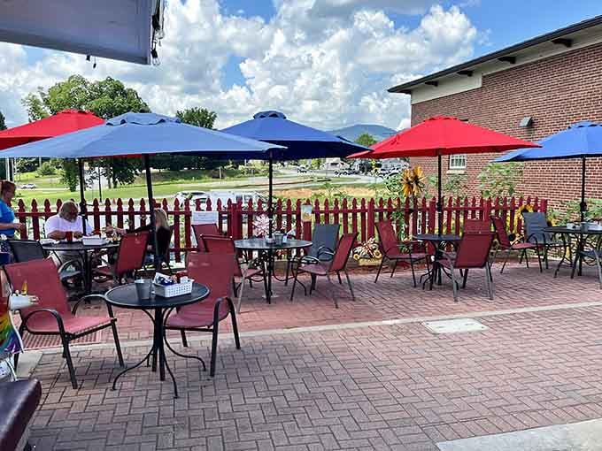 The outdoor patio offers front-row seats to downtown Blairsville's daily rhythm and mountain breezes.