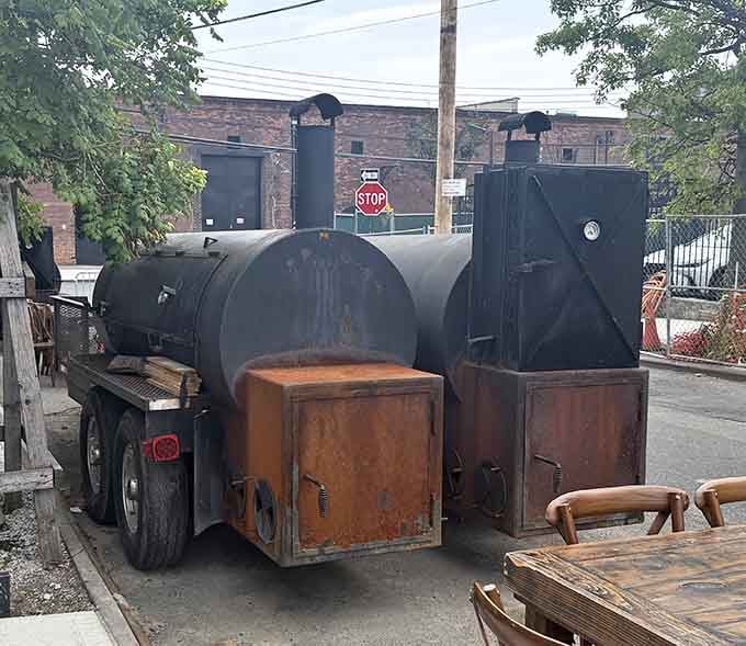 These battle-worn smokers outside work overtime producing the aromatic clouds that make Red Hook smell like paradise.