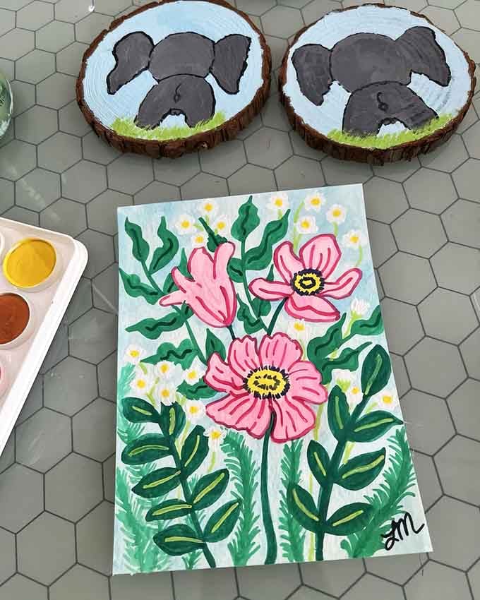 Puppy portraits and pink flowers show what happens when beginners embrace paint, brushes, and pure creative joy.