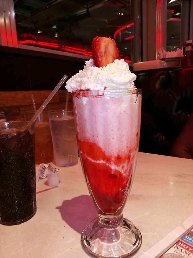 This strawberry creation towers with whipped cream ambition, making regular drinks look positively boring by comparison.