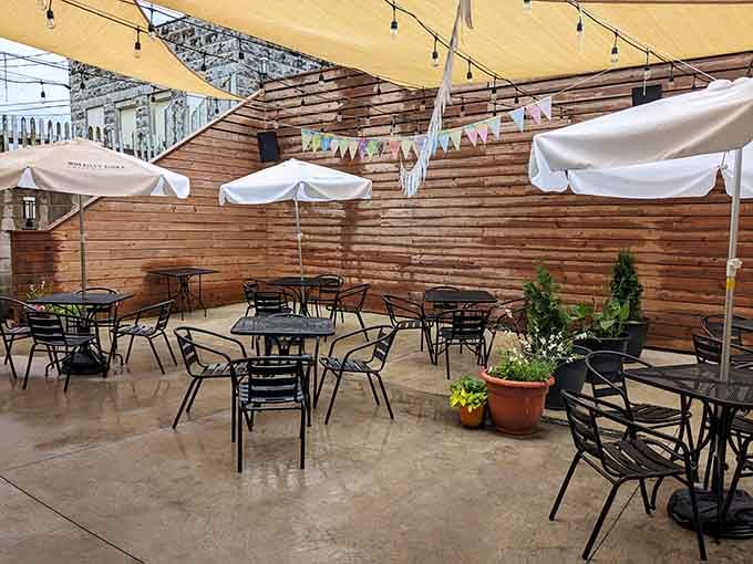 The patio offers al fresco dining under string lights, perfect for summer evenings when air conditioning feels criminal.