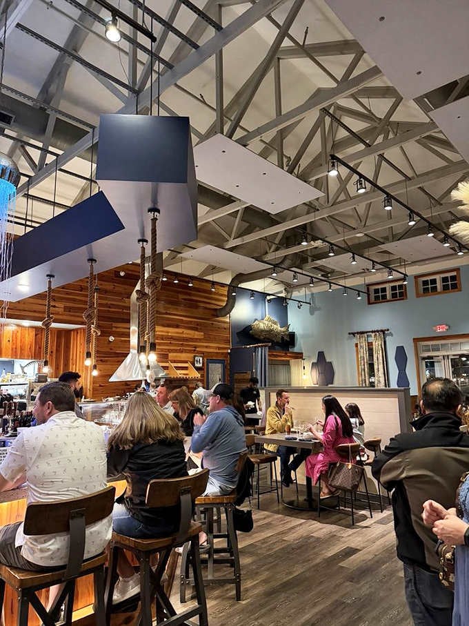 Diners gather under soaring ceilings and nautical accents, sharing meals that create memories worth repeating to anyone who'll listen.