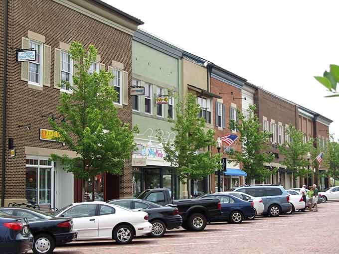 First Street's mix of brick facades and parked cars creates that lived-in charm you can't fake.