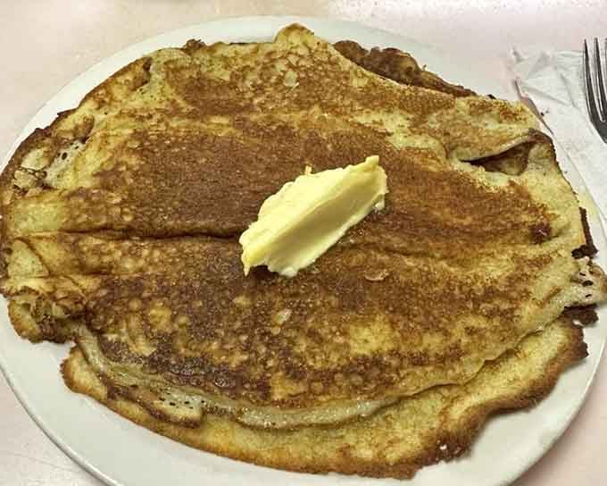 Pancakes the size of dinner plates, proving that bigger really is better when it's this delicious.