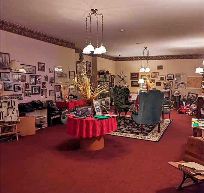 The main gallery space blends funeral home elegance with neighborhood nostalgia, creating an atmosphere that's uniquely haunting.