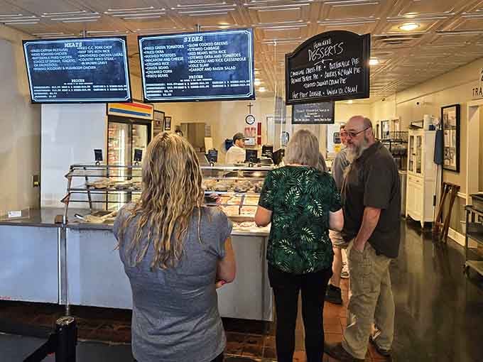 Customers queue up for their turn at comfort food heaven, where patience is rewarded with incredible home cooking.