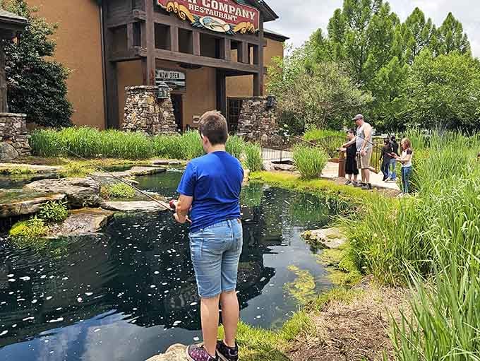 Kids fishing in the outdoor pond means parents can actually finish their meals in peace, which is priceless really.