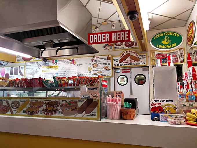 Order here and prepare for happiness, where vintage signs and colorful decor set the perfect carnival mood.