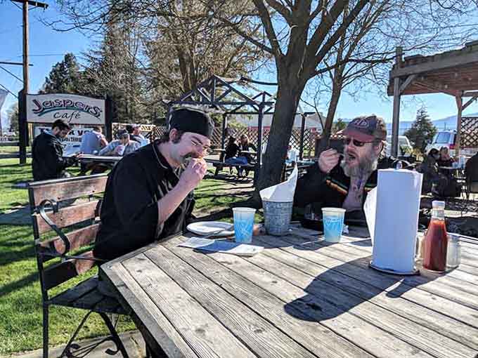 Picnic tables await your arrival, ready to witness the burger decisions you're about to make.