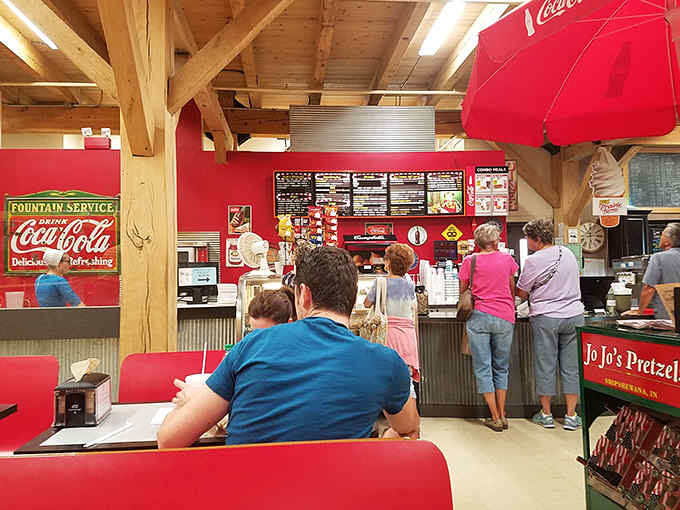 The counter where pretzel magic happens, complete with enough vintage signage to make collectors weep with joy.
