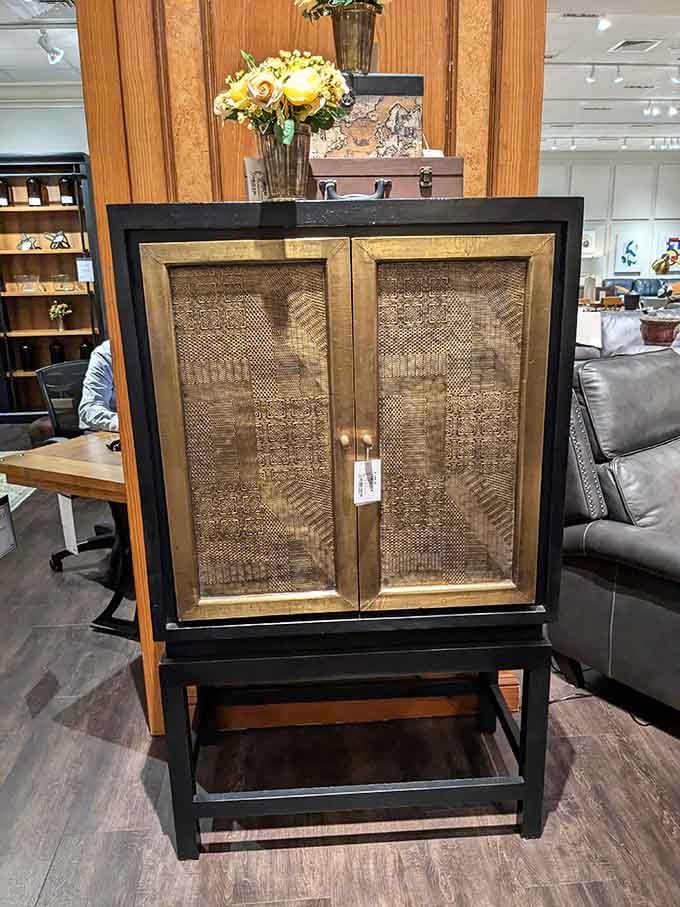 Bar cabinet with textured doors that hide your liquor collection while looking absolutely museum-worthy doing it.