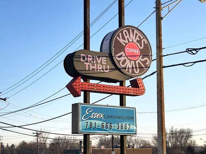 The vintage-style sign with the arrow pointing you toward happiness, also known as the drive-thru window of dreams.
