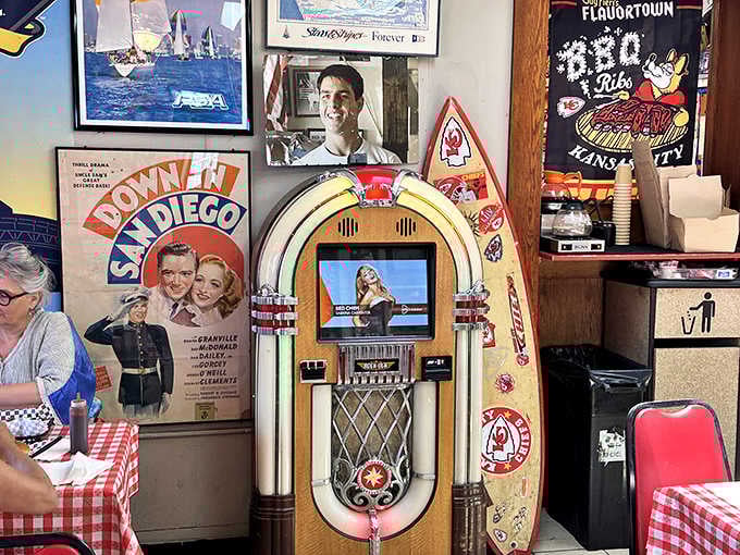 A classic jukebox stands ready to soundtrack your meal, though you already know which song to play.