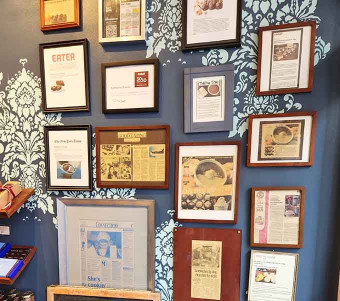 A wall of framed press clippings tells the story of a neighborhood gem that earned its stellar reputation.