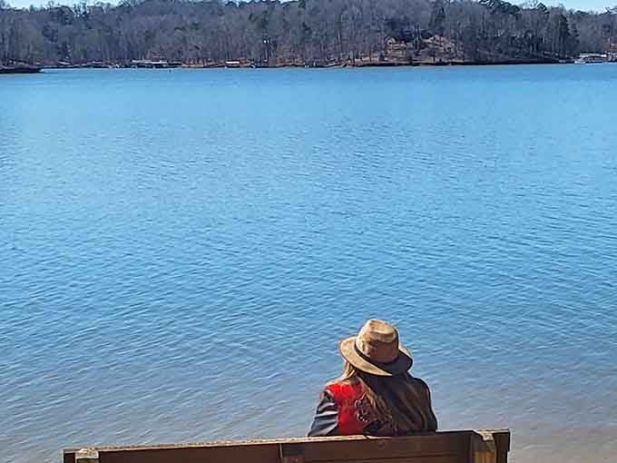 Sometimes the best seat in the house is a weathered bench, blue water, and absolutely nowhere else to be.