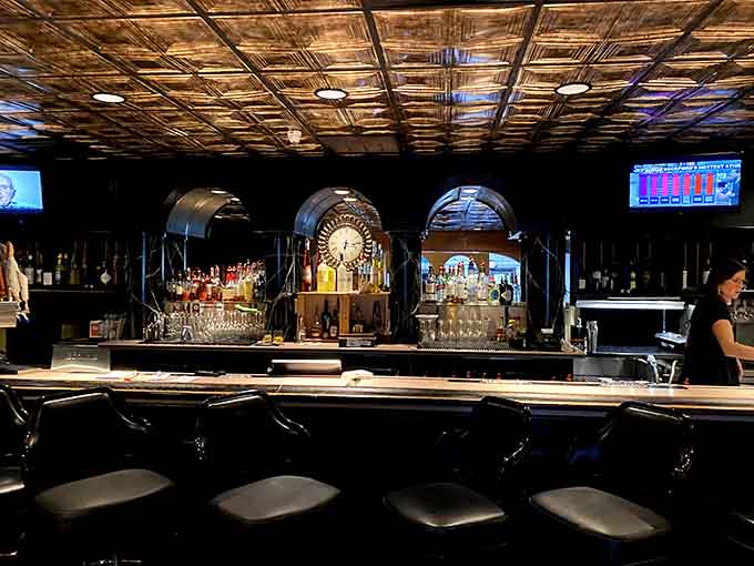 The bar area gleams with promise and possibilities, ready to mix your evening into something memorable.
