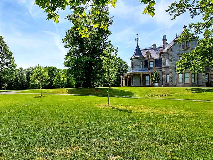 Those sweeping lawns stretch toward the mansion like a green carpet rolled out for visiting dignitaries and curious tourists alike.