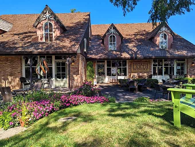 Flowers cascade in vibrant waves while charming architecture beckons you inside for wine and good conversation.