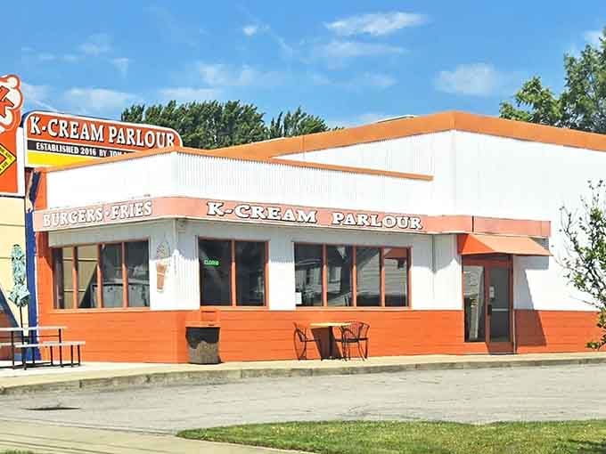 K-Cream Parlour's orange-and-white exterior promises sweet treats without the artisanal markup that ruins simple pleasures elsewhere.
