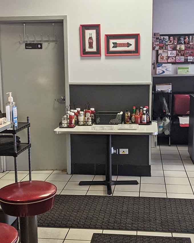 The condiment station stands ready with hot sauce and ketchup, letting you customize your breakfast experience perfectly.