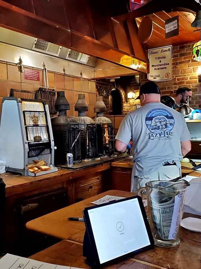 Those legendary vertical grills cooking away are the hardest-working antiques you'll ever see in active daily service.