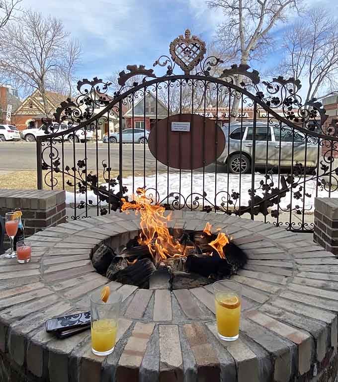 An ornate fire pit adds unexpected elegance to outdoor dining, making breakfast feel like a special occasion always.