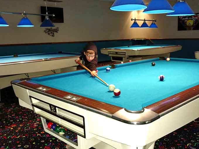 Pool tables providing backup entertainment, because sometimes you need to give your bowling arm a breather between frames.