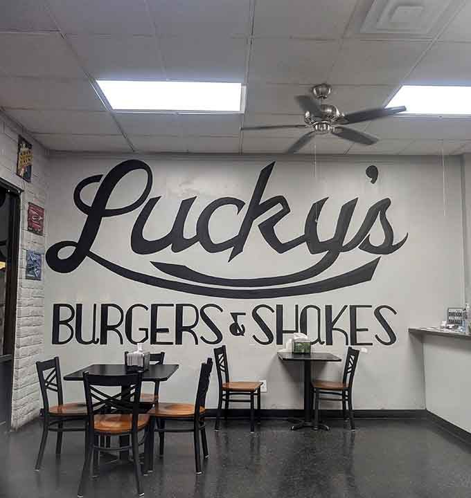 That wall logo says it all: this is where burgers and shakes come together in perfect harmony.