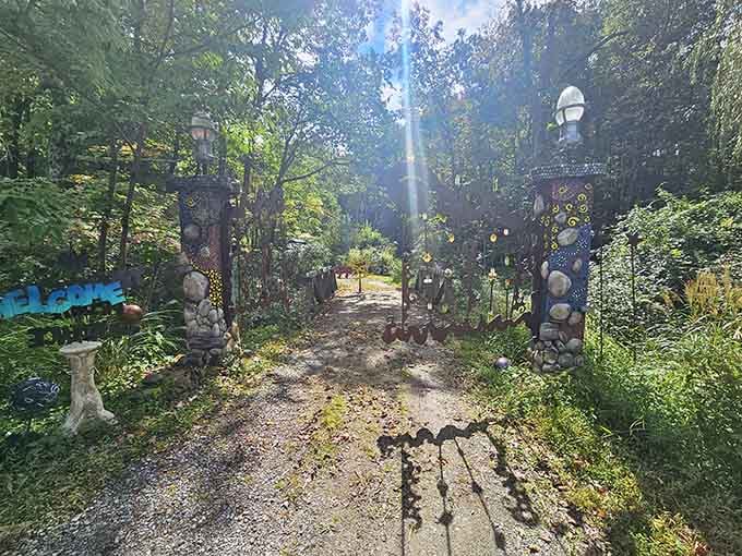 Sunlight streaming through this artistic gateway promises that something extraordinary waits just beyond those sculptural pillars.