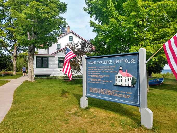 Grand Traverse Lighthouse marking the tip of the peninsula, where two bays meet and Instagram photos practically take themselves.