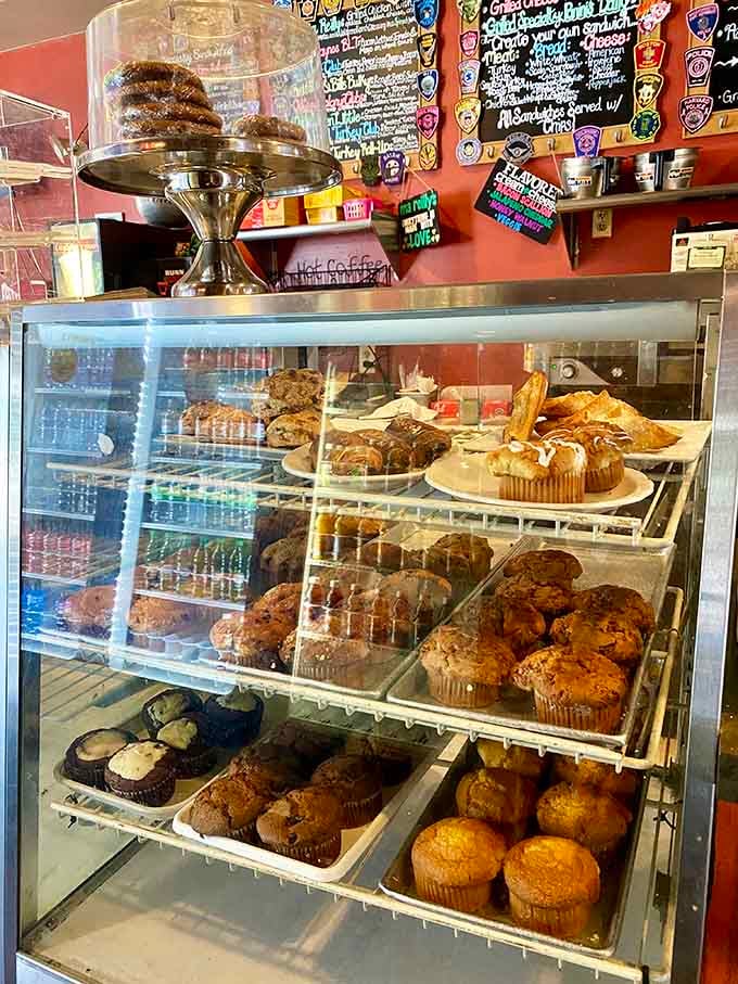 A pastry case packed with muffins, cupcakes, and baked goods that'll make choosing just one feel absolutely impossible today.