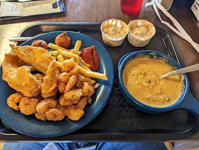Fried shrimp, catfish strips, hush puppies, and soup create a seafood lover's dream plate worth every single calorie.