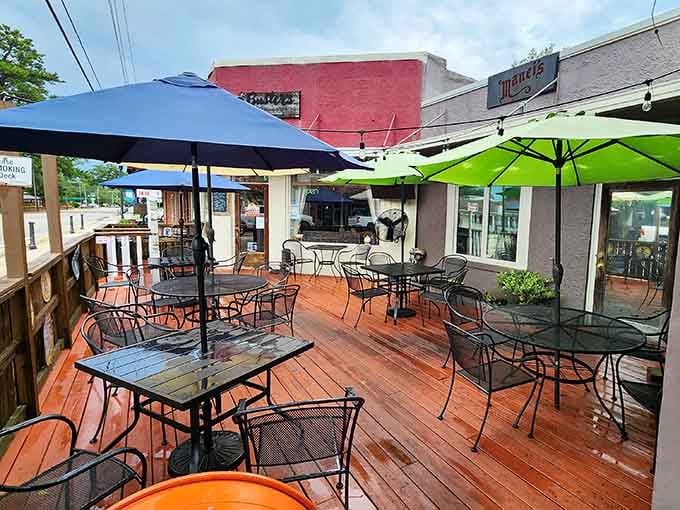 The outdoor deck offers fresh air, colorful umbrellas, and a perfect spot for Sunday brunch conversations.