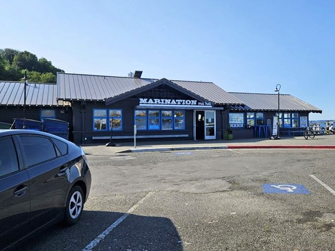 Parking lot views already hint at the waterfront magic waiting just beyond those doors.