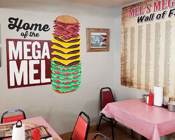 That "Mega Mel" wall of fame celebrates brave souls who conquered the ultimate burger challenge successfully.
