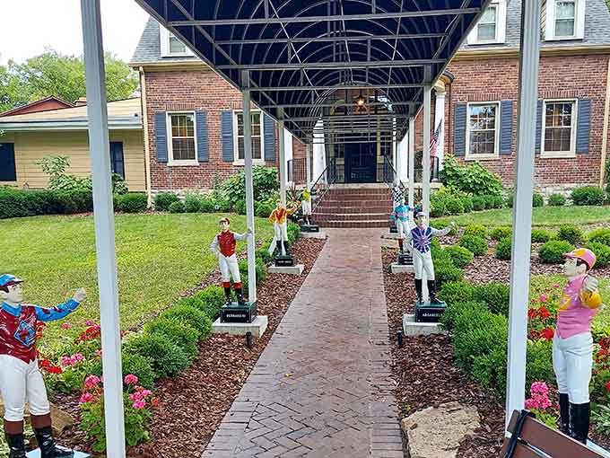 Colorful jockey statues line the walkway like cheerful sentries welcoming you to something extraordinary.